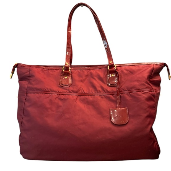 Tumi | Bags | Estee Lauder Wine Red Nylon Weekender Bag | Poshmark